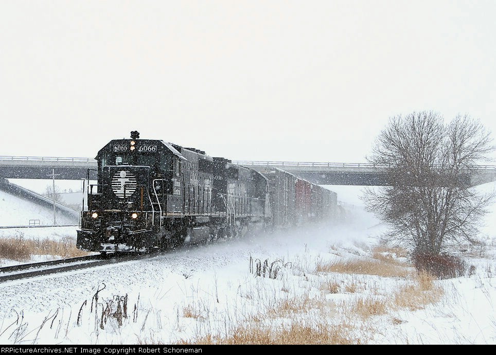 CN IC 6066 6016 have train T409 in hand during a heavy snow squall. Though CN favors IC ...